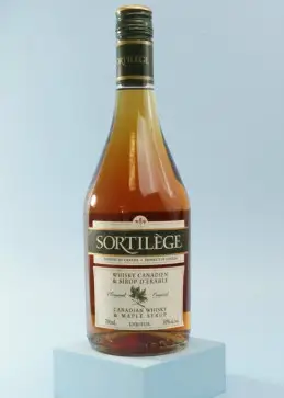Quebec grocery store: maple product, sortilège whiskey, poutine